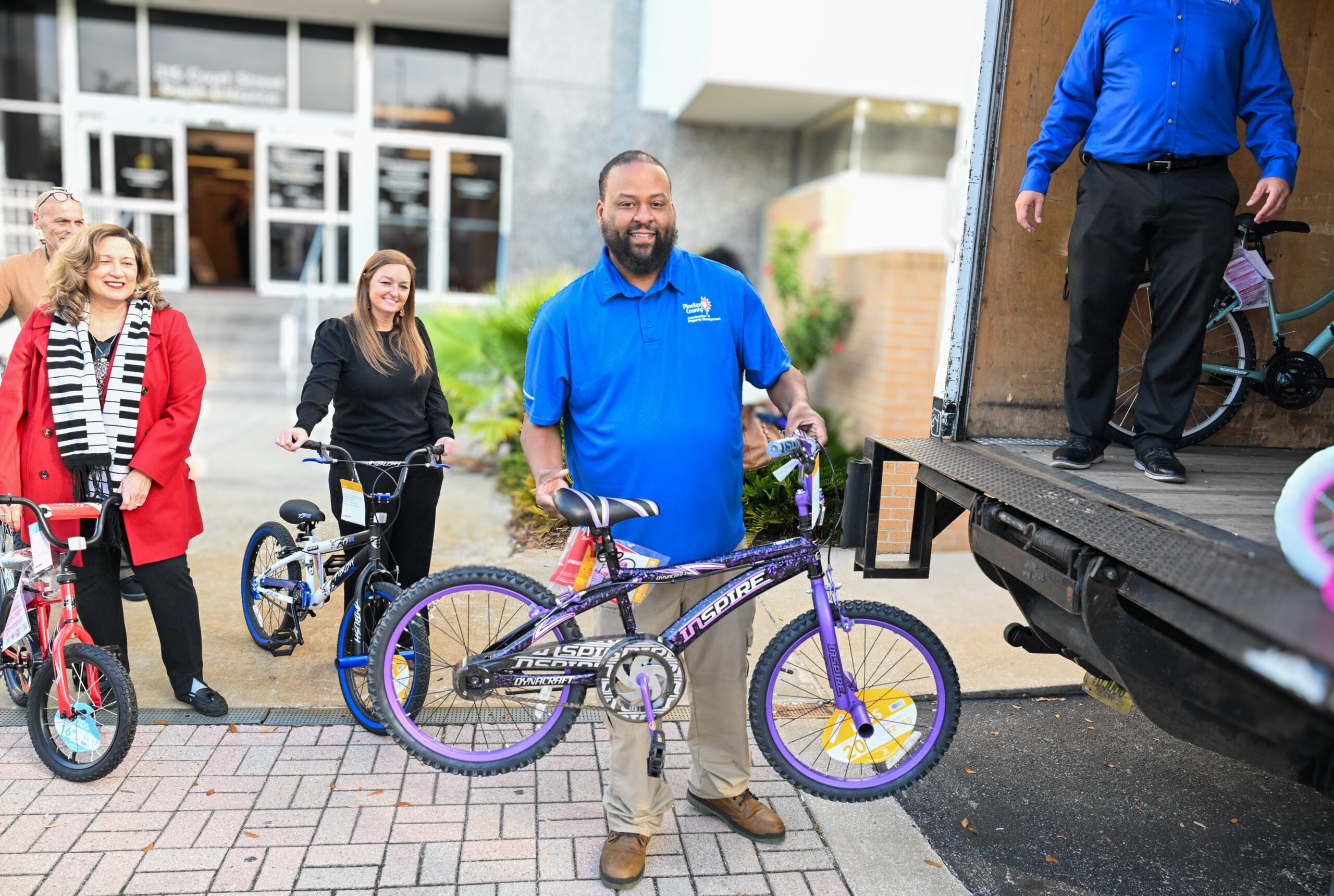 Employee Bike Drive brightens holidays for 70 families - Pinellas County